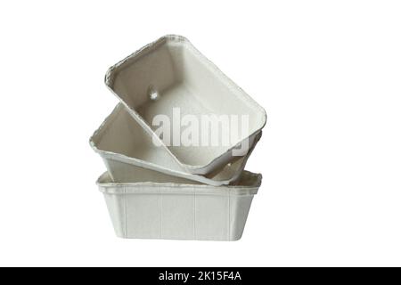 Biodegradable food trays made from pressed cardboard isolated on white ...