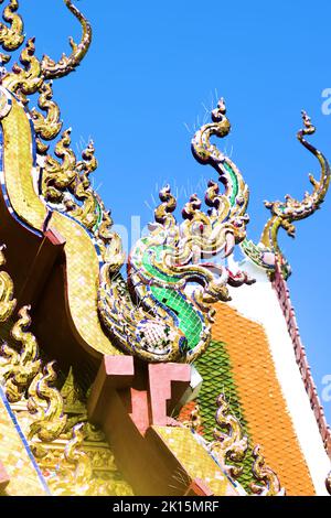 Elements of Thai Temple sculpture: dragon, three-faced janus, samsara ...