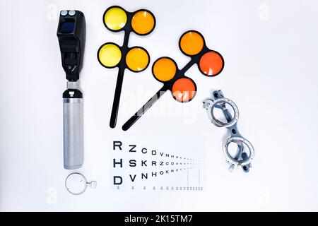 From above of retinoscope test chart optical tail lens frame and ...