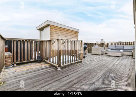 wooden terrace in roof top of a modern house building Stock Photo - Alamy