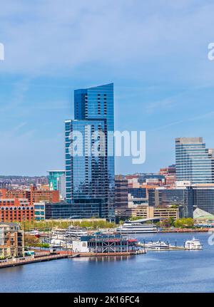 Apartment building and marina at the Inner Harbor in Baltimore ...