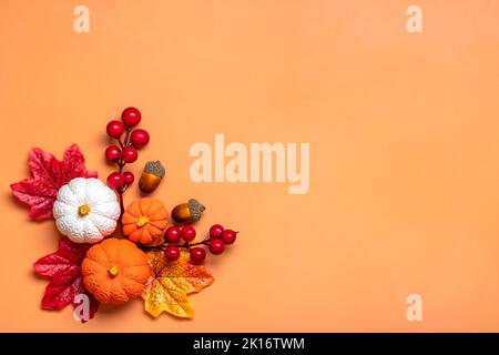 Autumn bouquet of acorns, berries, maple leaves, pumpkins isolated on ...