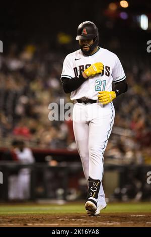 Arizona Diamondbacks third baseman Emmanuel Rivera (13) rounds third ...