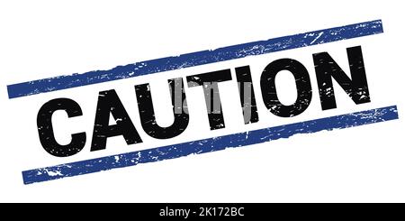 CAUTION text written on black blue sticker stamp Stock Photo - Alamy