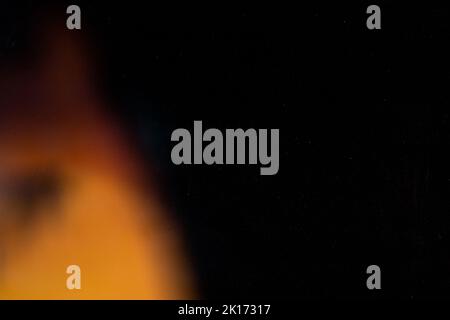 colorful warm rainbow light leaks on black background with dust texture ...