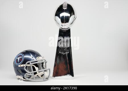 A Tennessee Titans helmet with Super Bowl Vince Lombardi Trophy ...