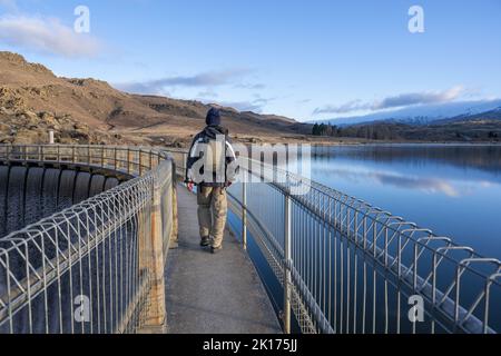 Water falling over Butchers Dam spillways. Alexandra, Central Otago ...