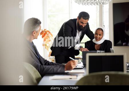 Business people talking in board room Stock Photo - Alamy