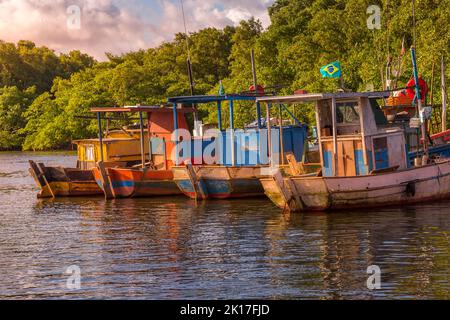 Bay at sunset with fishing trawler rustic boats in Porto Seguro, BAHIA ...