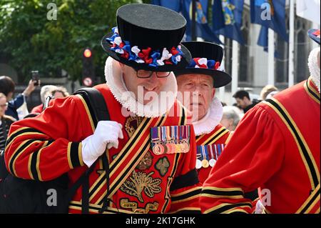 Beefeater. Mourners left Westminster Hall having paid their respects to ...