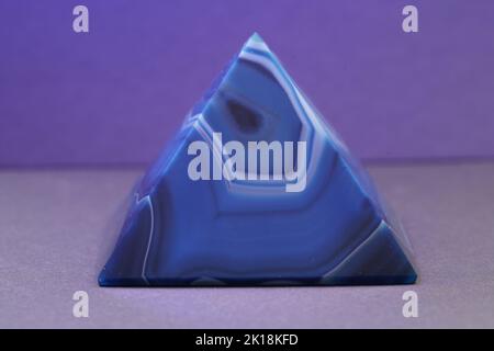 Blue violet pyramid of agate with quartz inclusions or worked as a disc ...