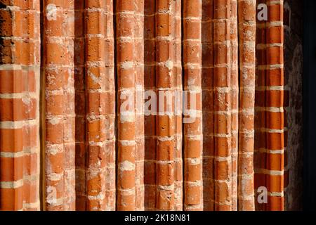 Jamb facings of a church portal with archivolts from the Brick Gothic ...