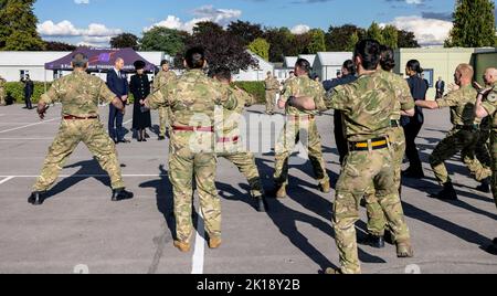 The Prince and Princess of Wales watch New Zealand troops performing ...