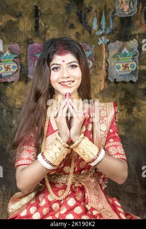 Agomoni concept photo shoot, A poses for the camera with an unfinished ...