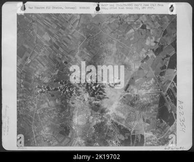 Bombs burst on the target near the city of Naga on Cebu Island in the ...