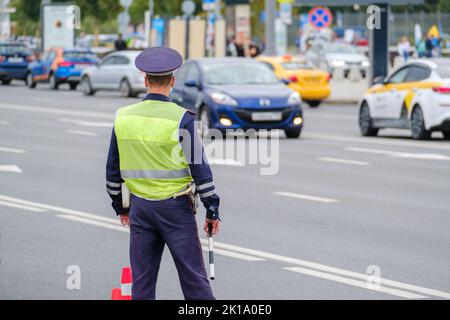 Traffic officer standing near road Stock Photo - Alamy