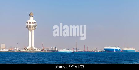 Skyline of Jeddah Islamic Seaport with white traffic control tower ...