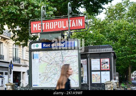 Illustration picture shows people walking past a sign with the subway ...