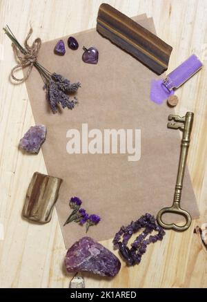 Amethyst Stones With Petrified Wood on Old Paper With Dried Flowers ...