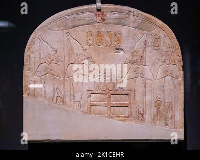 stela fragment with four standing sculptures, 18th dynasty, reign of ...
