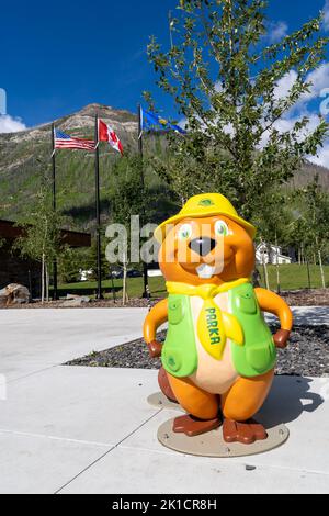 Waterton, Alberta, Canada - July 5, 2022: Red bear and cub statue at ...