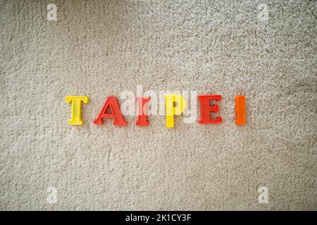 Taiwan wording spelled by yellow and red alphabet puzzles Stock Photo ...