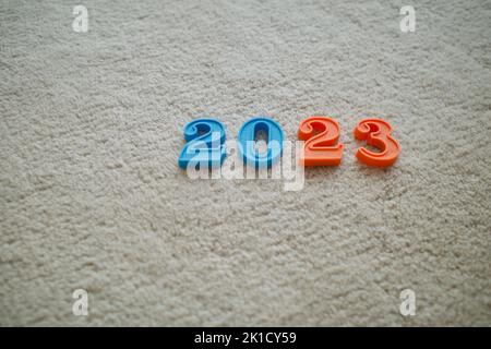 The word 2023 is placed in white fabric Stock Photo - Alamy