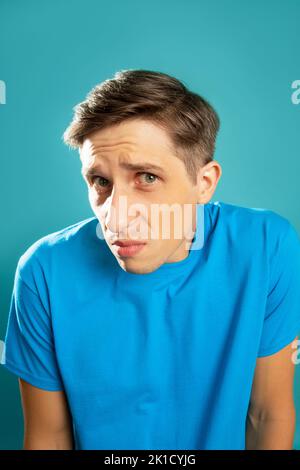 Puzzled man. Unsure emotion. Refusal gesture. You mean what. Clueless ...