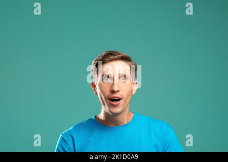 Shocked man. Wow emotion. Invisible present. Unbelievable think ...