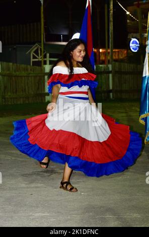 A Belizean woman dancing in the San Pedro, Belize, Carnival 2022 ...