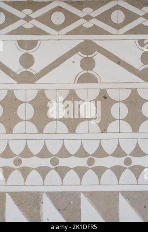 A vertical shot of traditional geometric patterns on the house in the ...