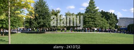 people joining the queues along the banks of the River Thames to pay ...