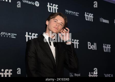 Actor Christopher Briney poses for a photograph on the red carpet ...