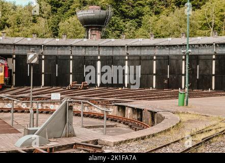 Old german railway roundhouse in Gniezno, Poland. Ruins, rust and decay ...