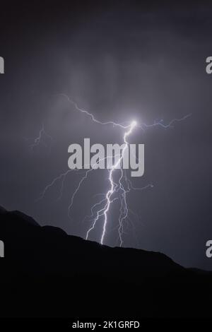 Beautiful shot of lightning at night for wallpaper and background Stock Photo - Alamy
