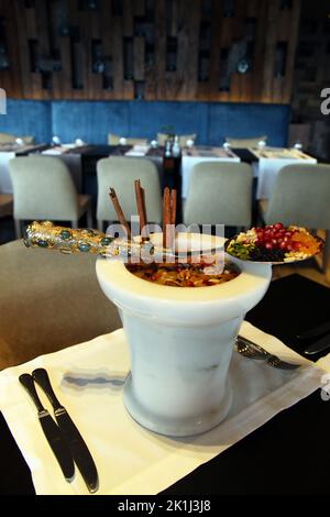 Homemade asure or Noah's pudding. Traditional Turkish desserts. Turkish ...