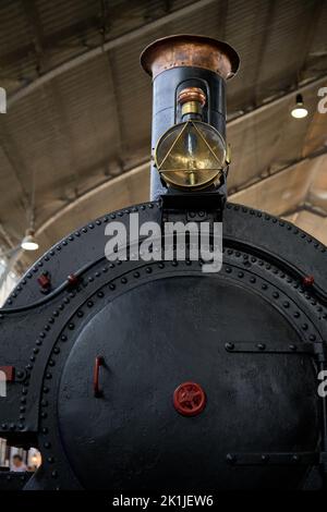 A vertical of an old Spanish steam locomotive detail at Delicias ...