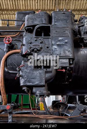 A vertical of an old Spanish steam locomotive detail at Delicias ...
