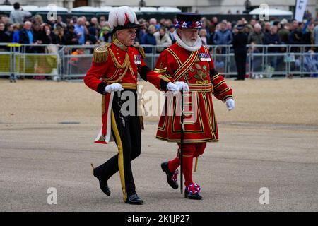 A Yeomen of the Guard (right) and Gentlemen at Arms members take their ...