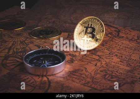 Compass and bitcoin. Travel and cryptocurrencies. Buying tickets with ...