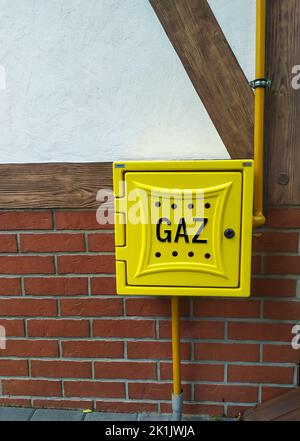 Yellow metal gas connection box at the construction site of new house ...