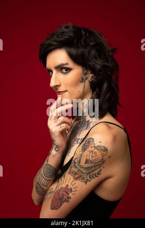 Portrait of confident transgender woman with tattoos Stock Photo - Alamy