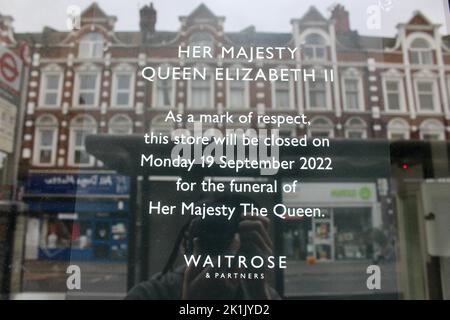 waitrose shop window displays and closed signs in muswell hill on 19th ...