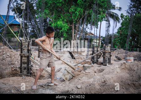 Poor children working at construction site against children labour ...