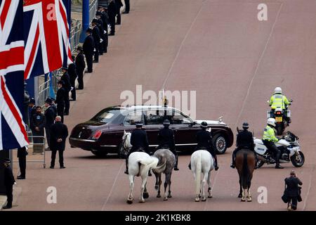 King Charles III motorcade is driven along The Mall in central London ...