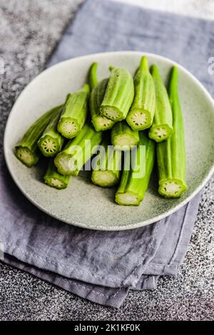 Overhead view of a stack of prepared okra on a plate Stock Photo - Alamy
