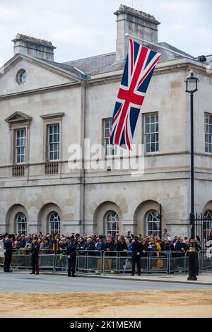 Prince Philip and Prince Charles watch as the coffin containing the ...