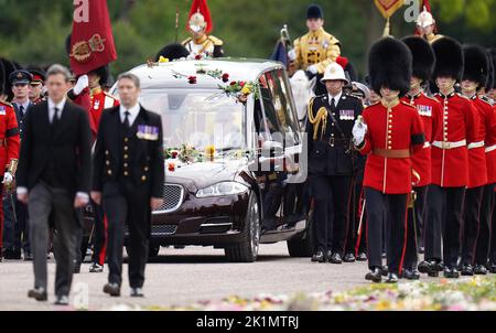 Soldiers from the Grenadier Guards escort the State Hearse as it ...