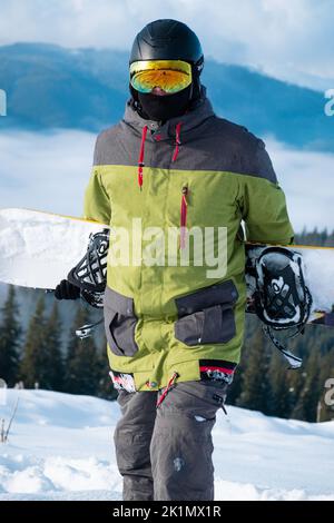 man snowboarder portrait carpathian mountains on background Stock Photo ...