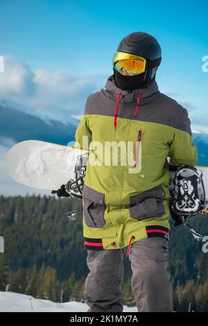man snowboarder portrait carpathian mountains on background Stock Photo ...